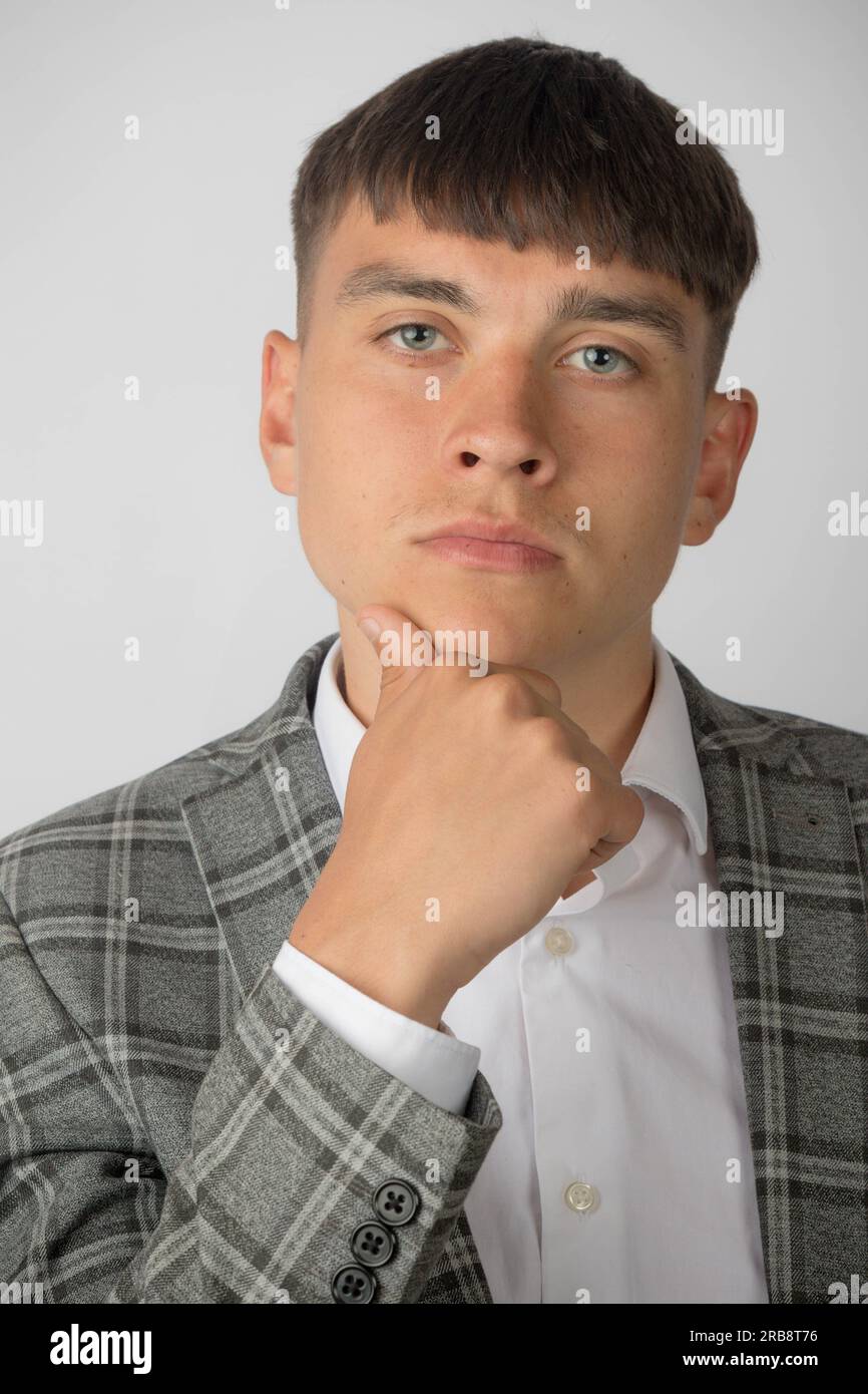 Young entrepreneur wearing a suit jacket and open neck shirt without a ...