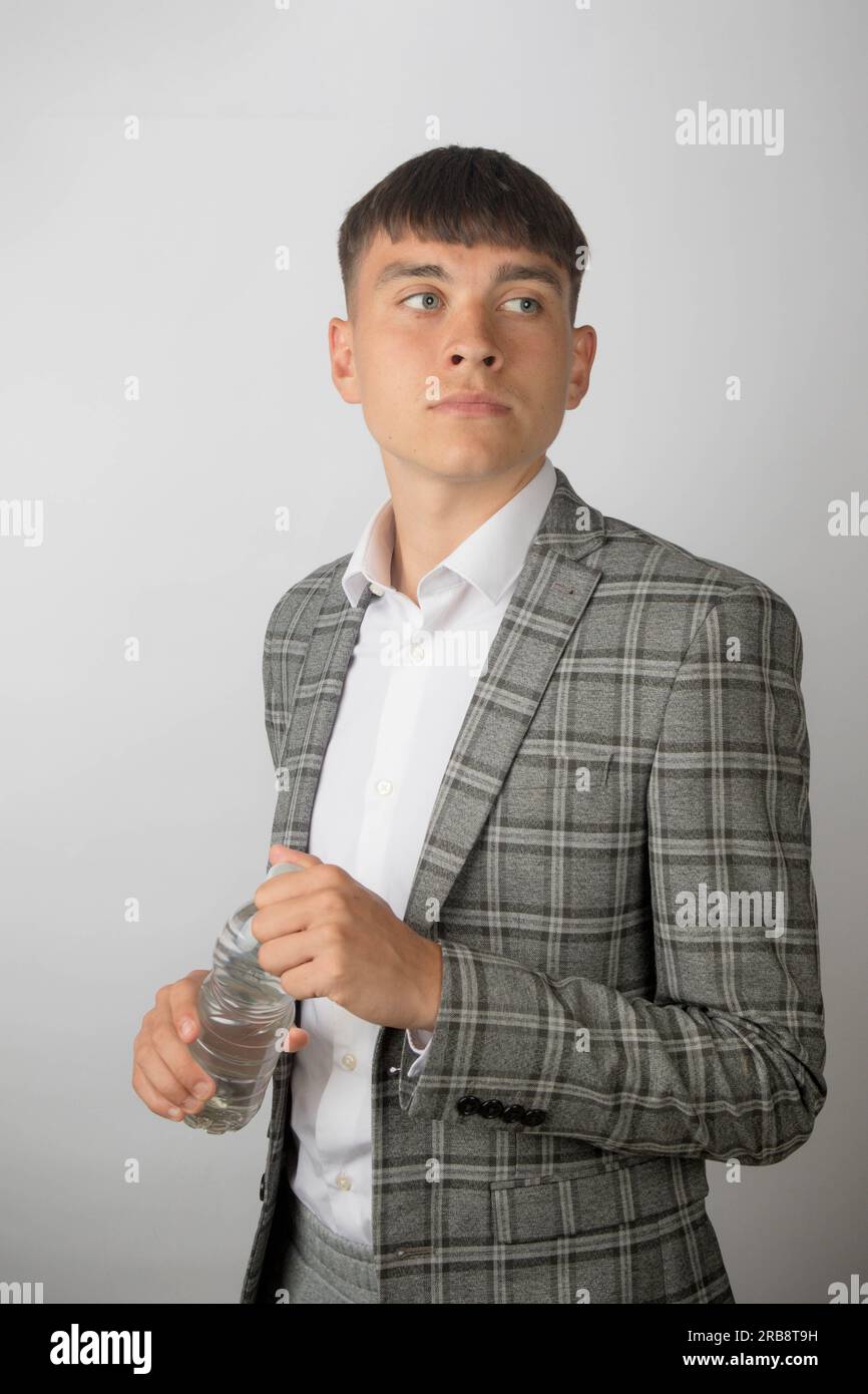 Young entrepreneur wearing a suit jacket and open neck shirt without a ...