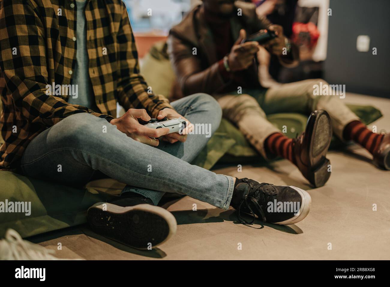 Friendship, technology, games and home concept - smiling male friends ...