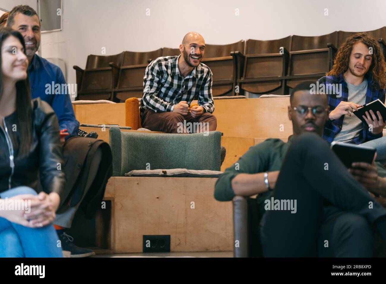 Burst out laughing during presentation Stock Photo - Alamy