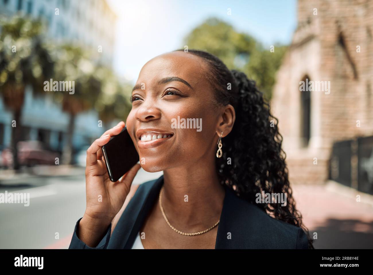 Happy black woman, phone call and city in travel, conversation or ...