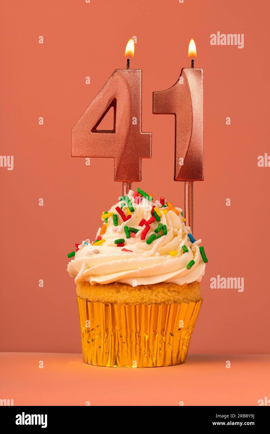 Birthday cake with candle number 41 - Coral fusion background Stock ...