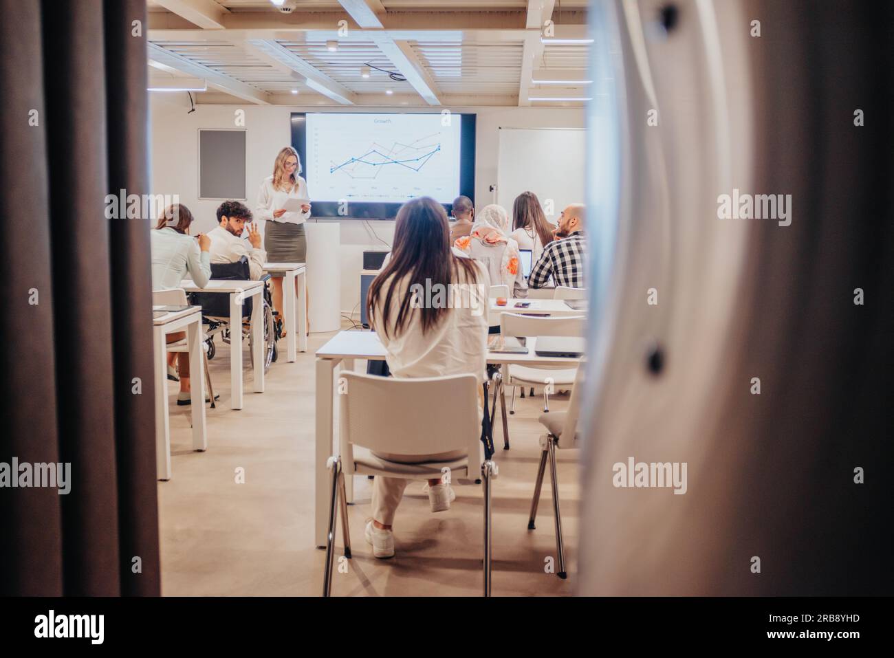 Multicultural business people having training at the classroom ...
