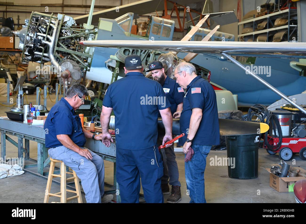 American aircraft engineers working on an aricraft engine Stock Photo ...