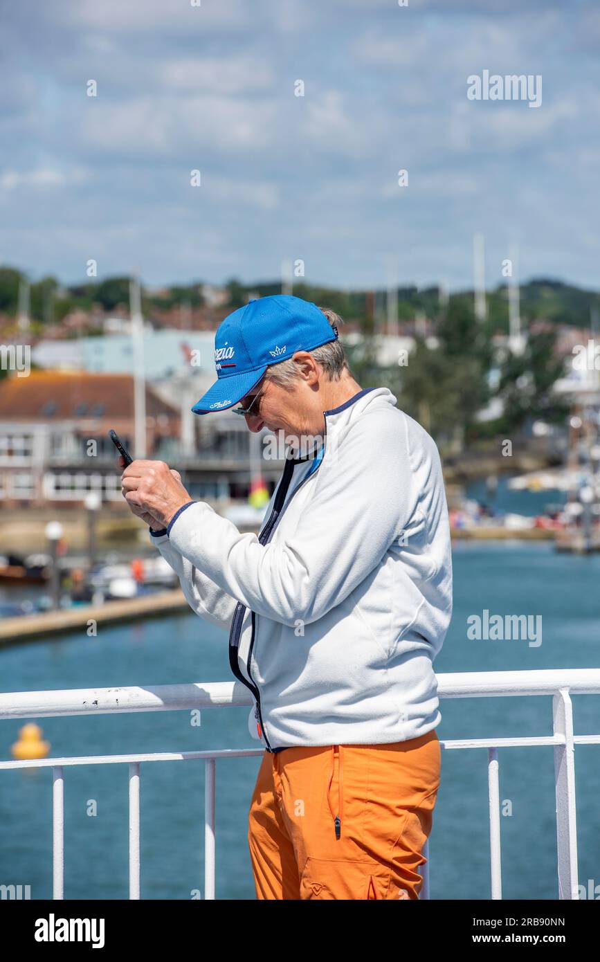 Visitor using camera hi-res stock photography and images - Alamy