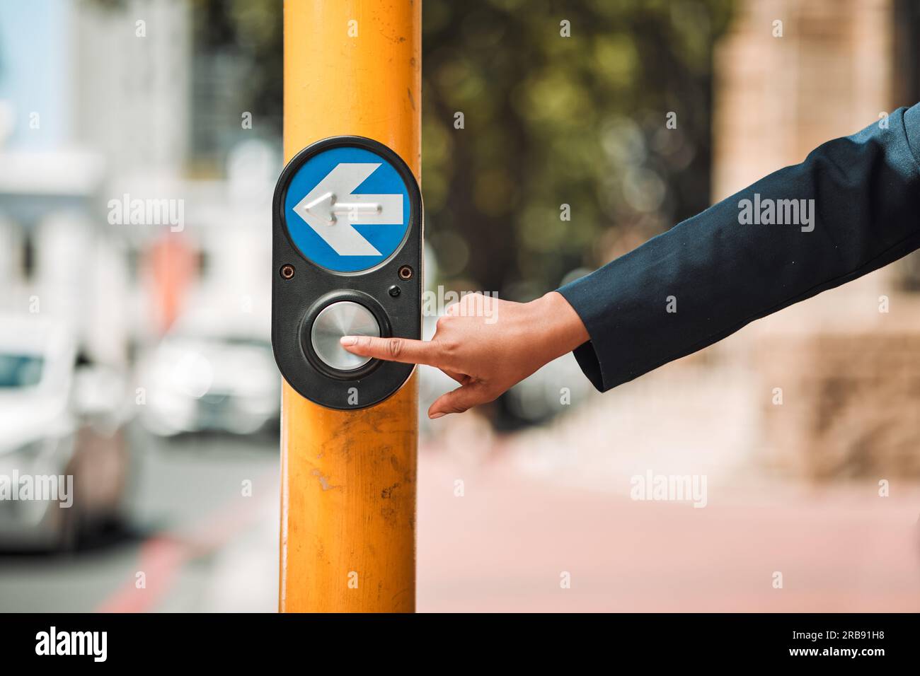 Woman, hands and arrow button on road in city for pedestrian crossing ...
