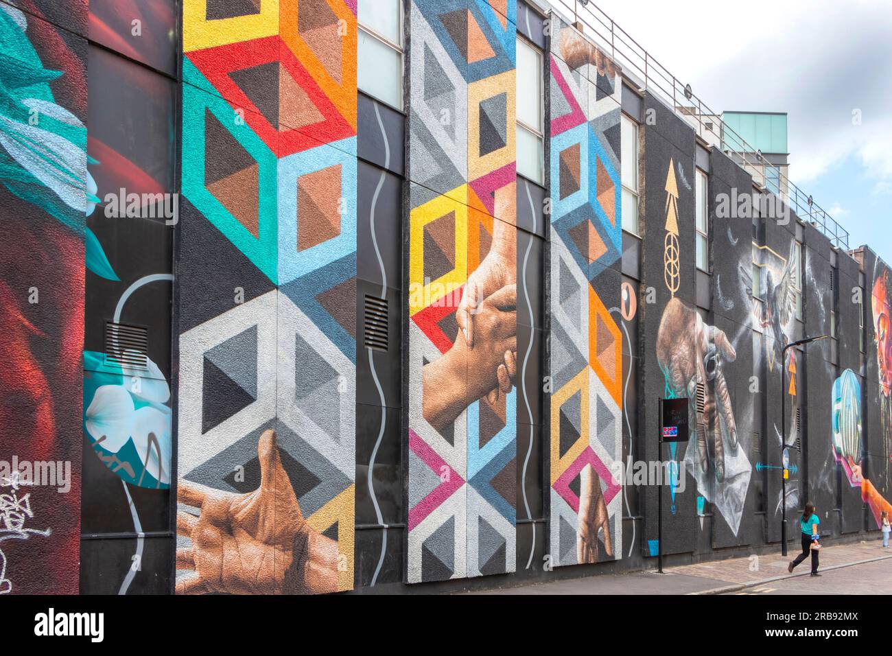 colourful grafitti and wall art painting on buildings in new inn yard ...