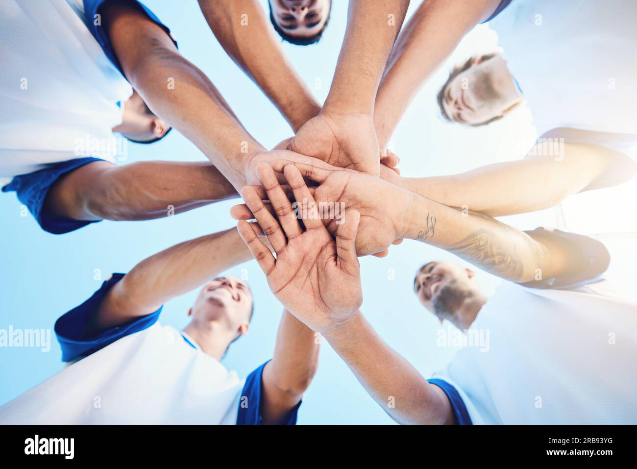 Sports, circle and football team with their hands together for ...