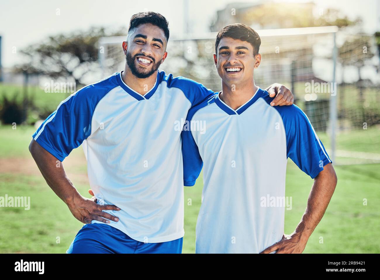 Football player, team and portrait of men together on a field for ...