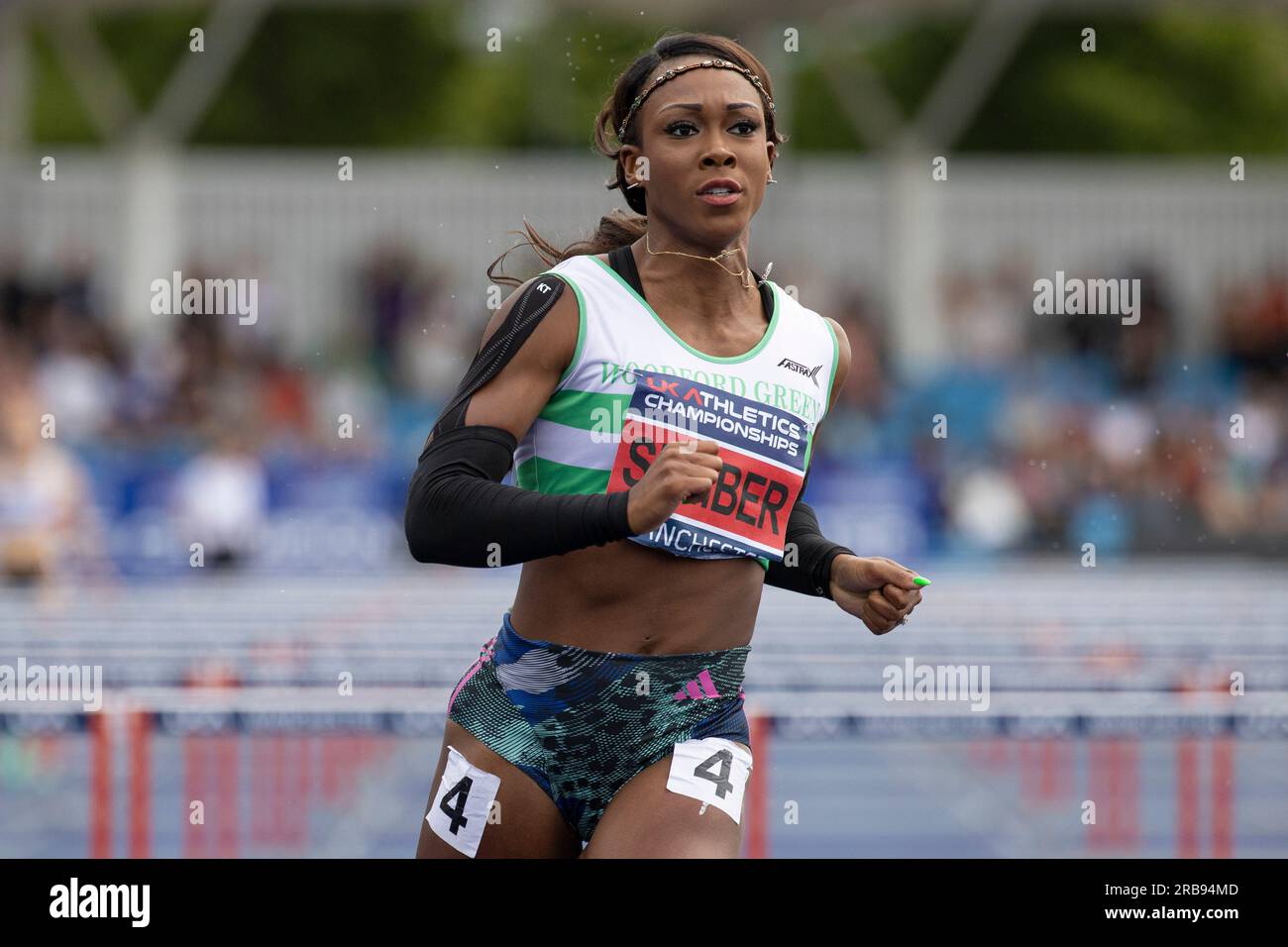 Cindy Sember on her way to winning the women’s 100m hurdles during the ...