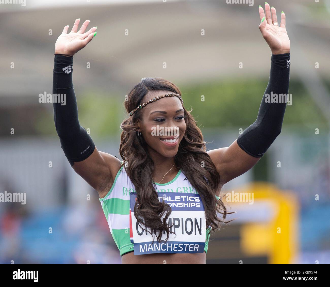 Cindy Sember on the medal podium after winning the women’s 100m hurdles ...