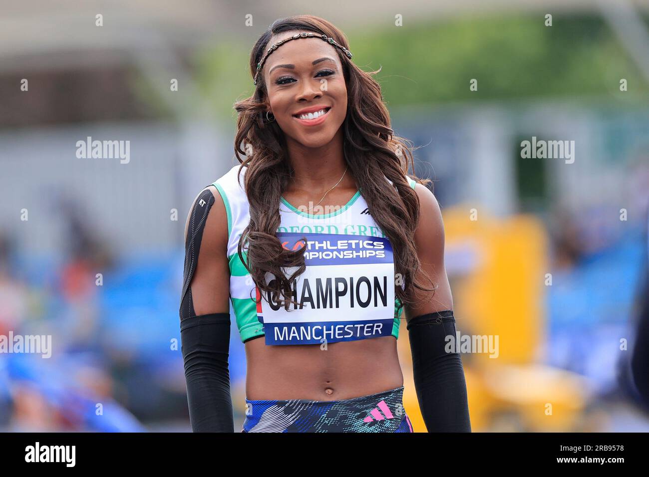 Cindy Sember on the medal podium after winning the women’s 100m hurdles ...