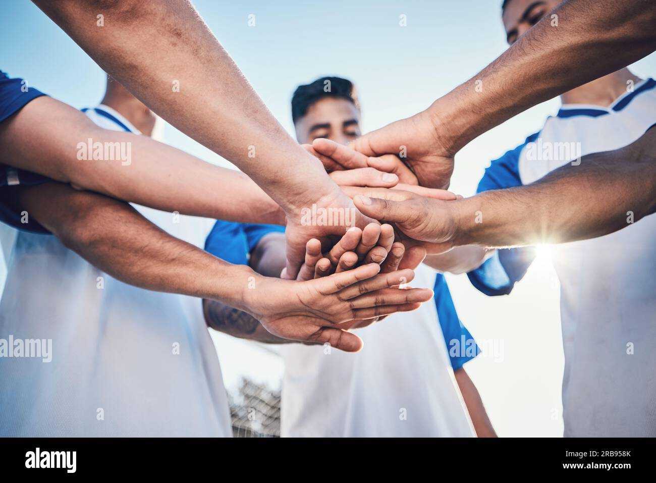Soccer, hands together and teamwork, support and sports for training at ...