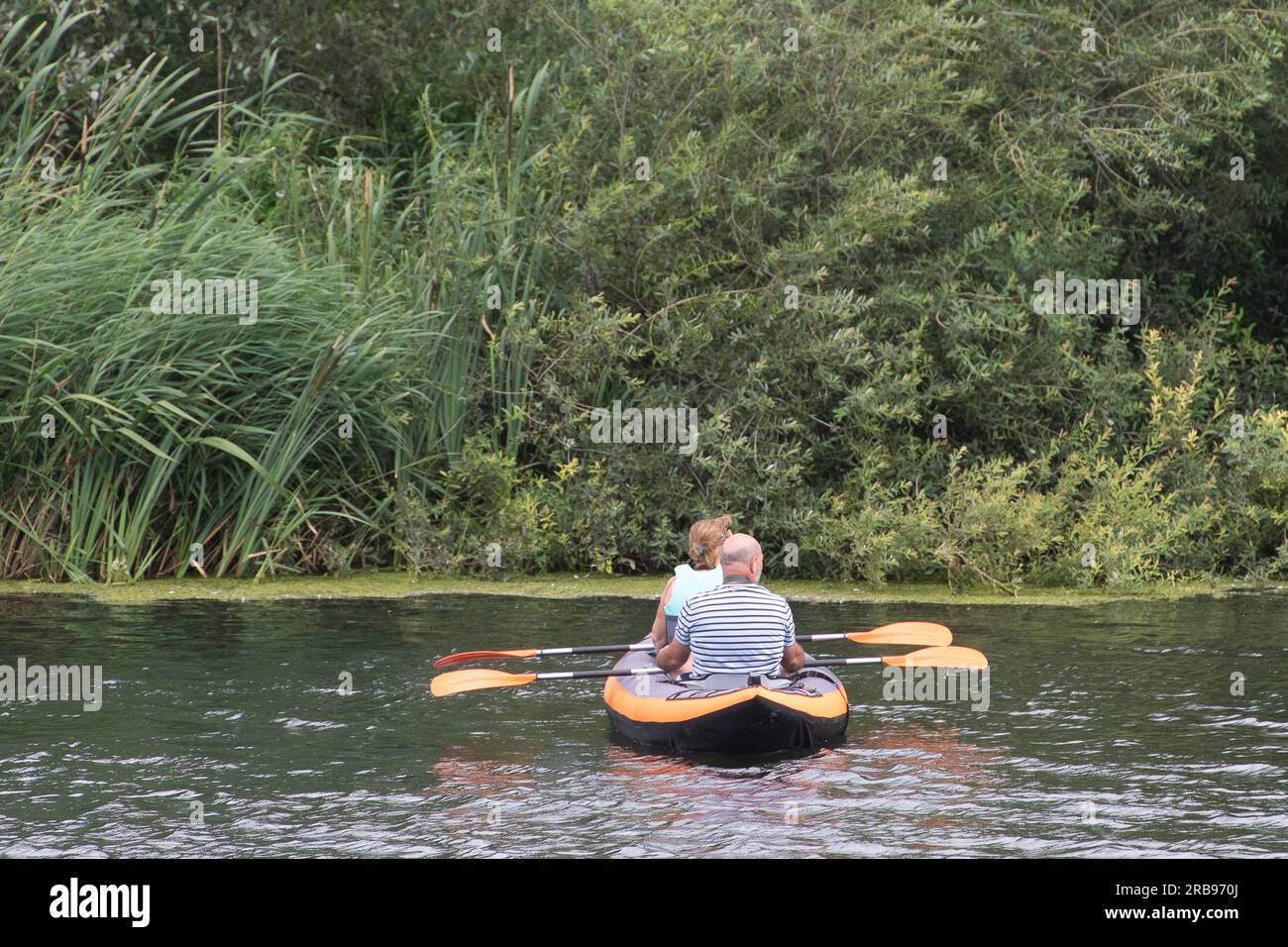 Dorney, Buckinghamshire, UK. 1st July, 2023. A couple out on a kayak on ...