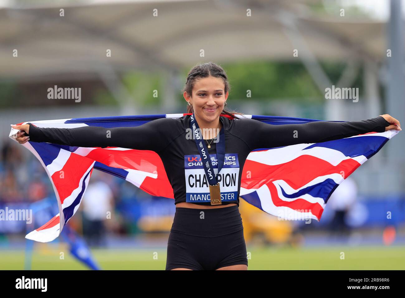 Georgina Forde-Wells celebrates winning the women’s triple jump during ...