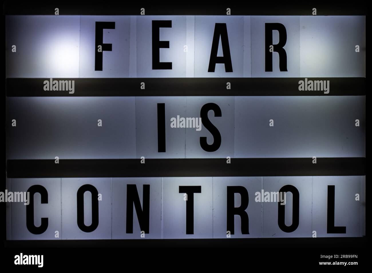 Fear Is Control text on light box Stock Photo - Alamy
