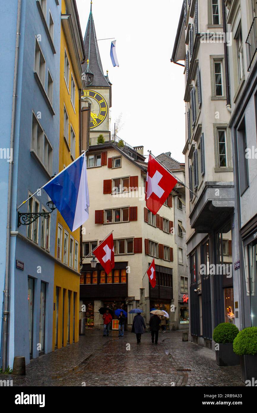 Zurich city centre with Swiss flags on a rainy day Stock Photo - Alamy