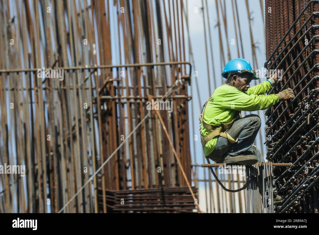 Quezon City, Philippines. 8th July, 2023. A worker is seen at a ...