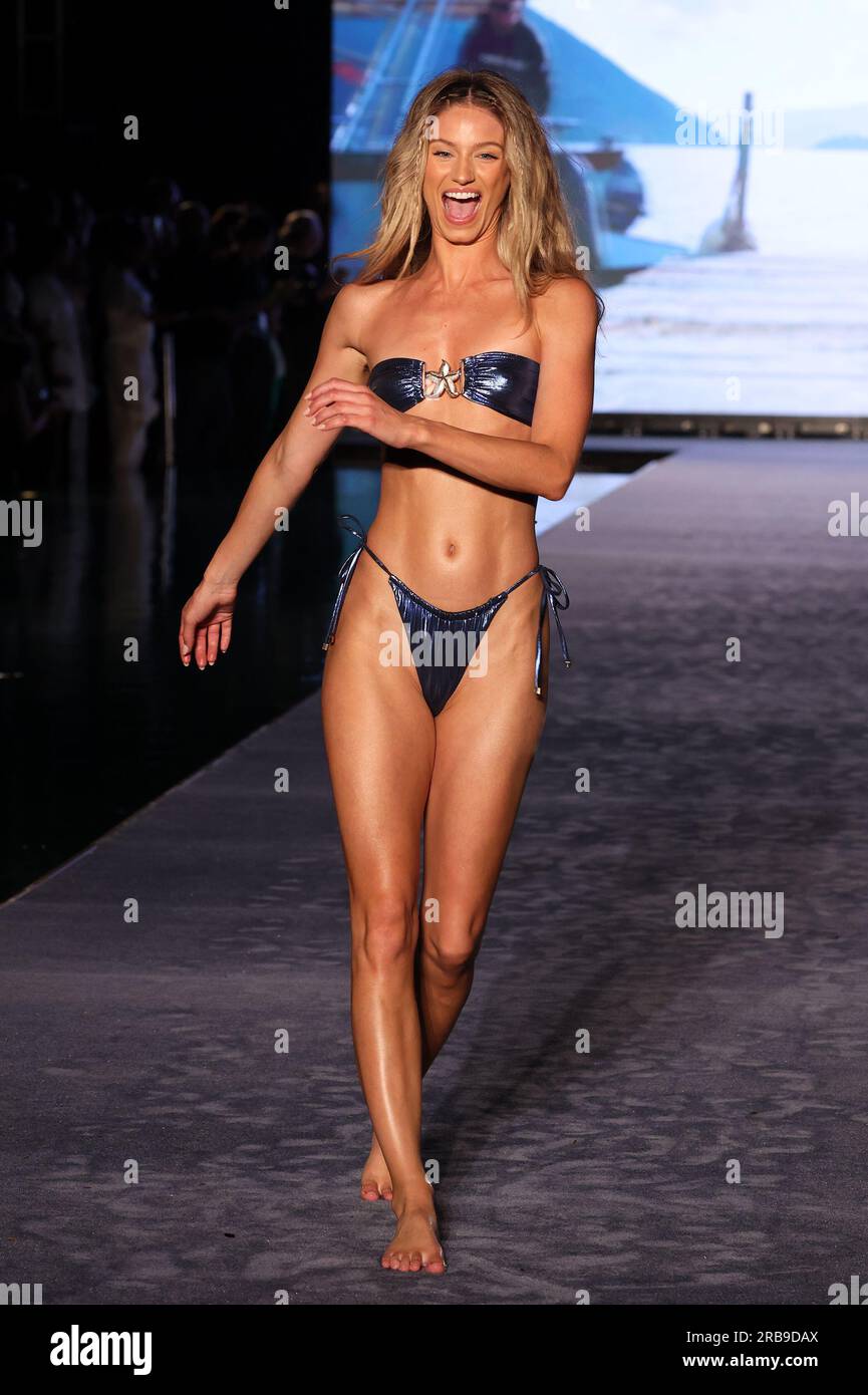 Miami, USA. 07th July, 2023. MIAMI BEACH, FLORIDA - JULY 07: Berkleigh Wright walks the Sports ...