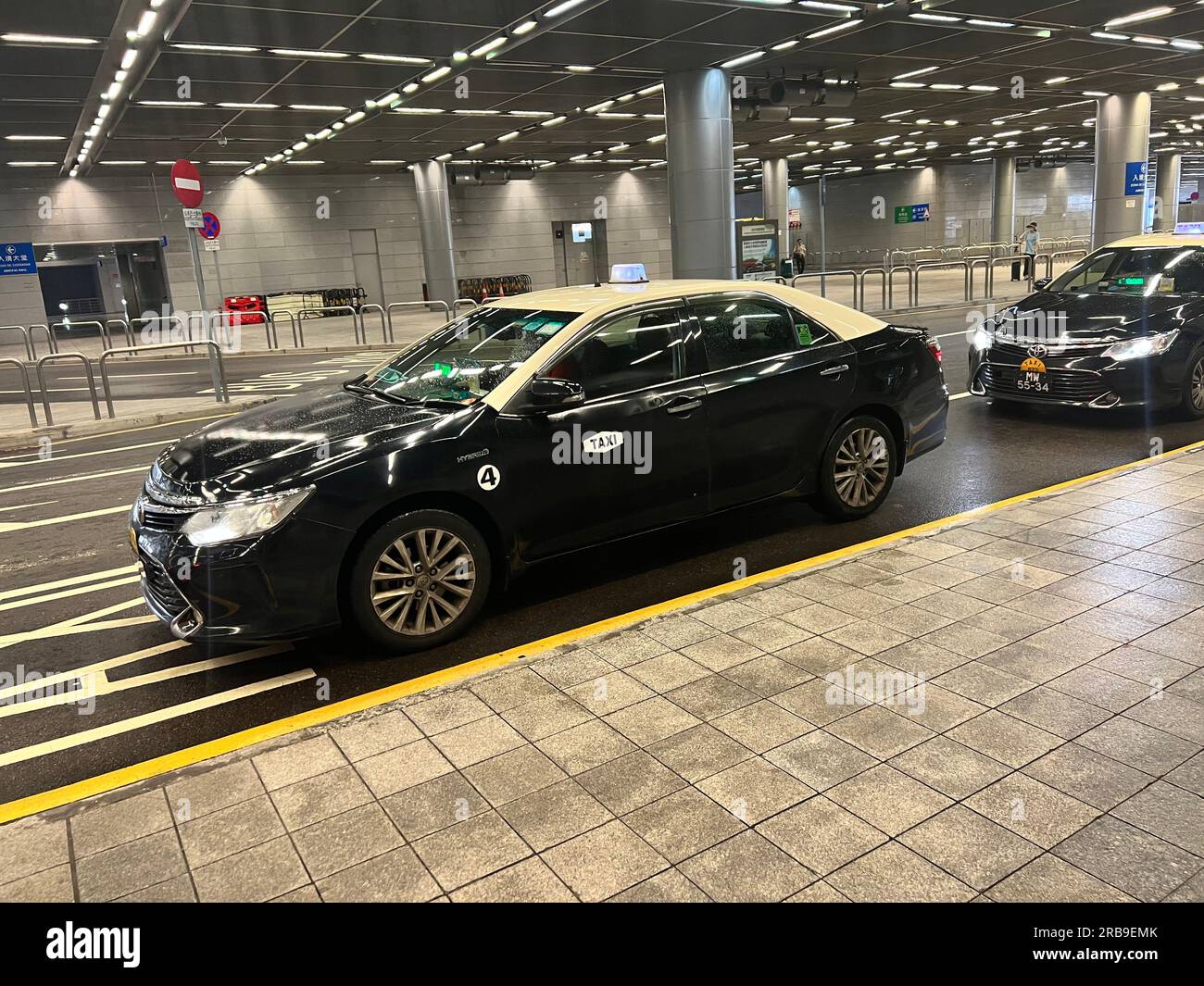Macau, China July 2 2023: taxi waiting in the terminal of Taipa Ferry ...