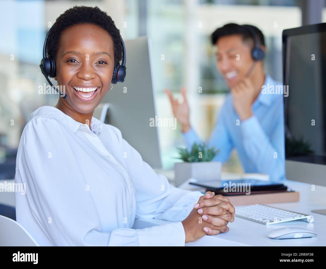 Portrait, call center and black woman on computer in office consulting for crm, contact us or ...