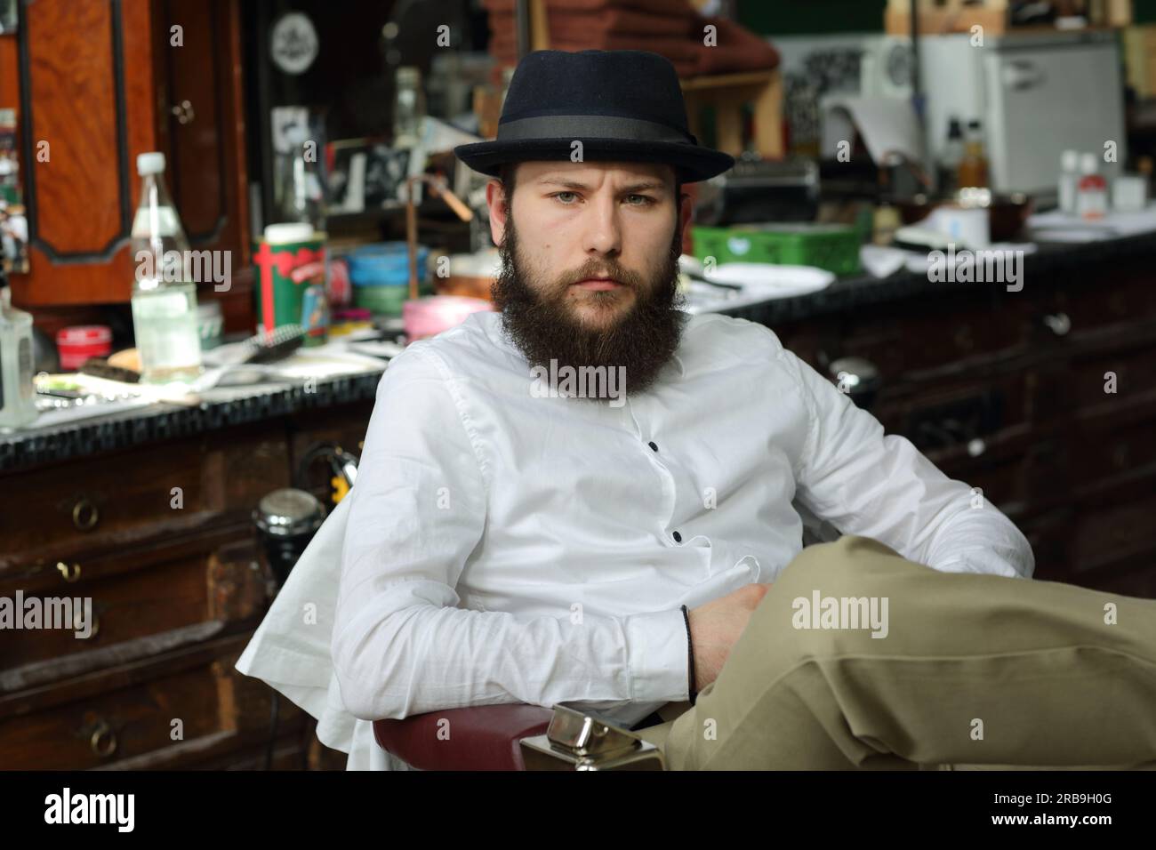 Young business owner in his barber shop Stock Photo - Alamy