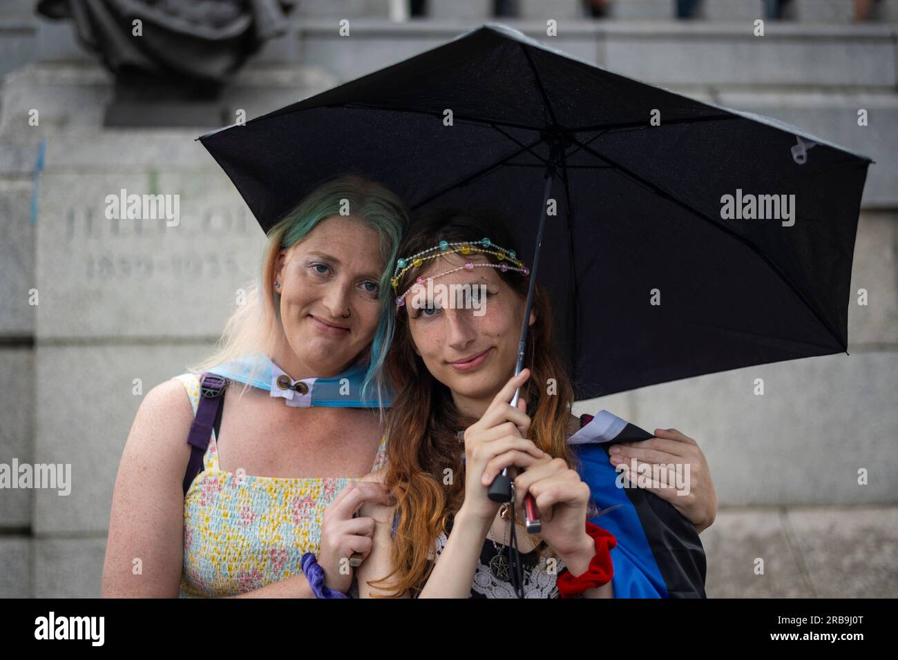 London, UK. 8 July 2023. People in Trafalgar Square, where flowers were ...