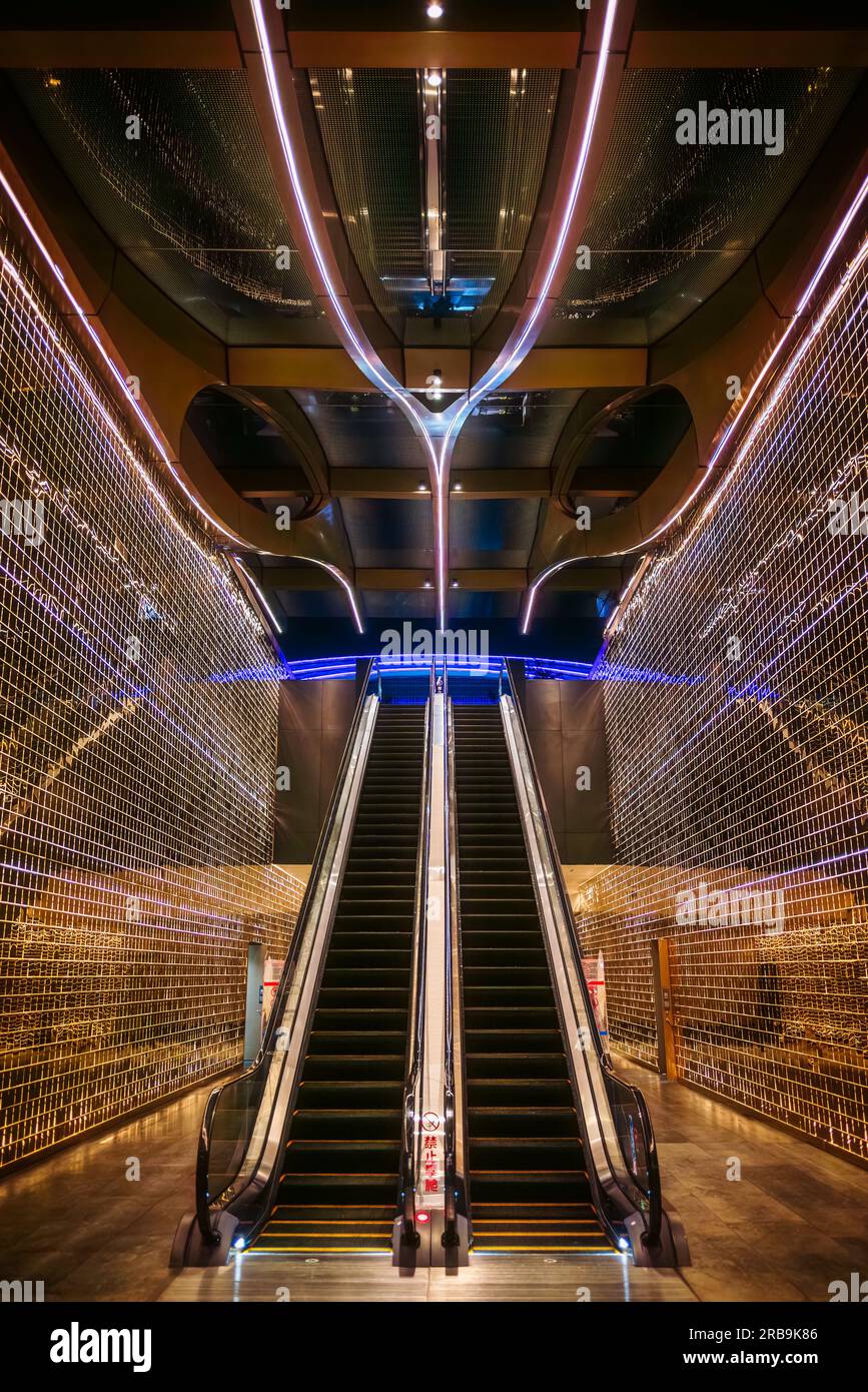 Electric stairs in SKP modern commercial mall at night in Chengdu Stock ...