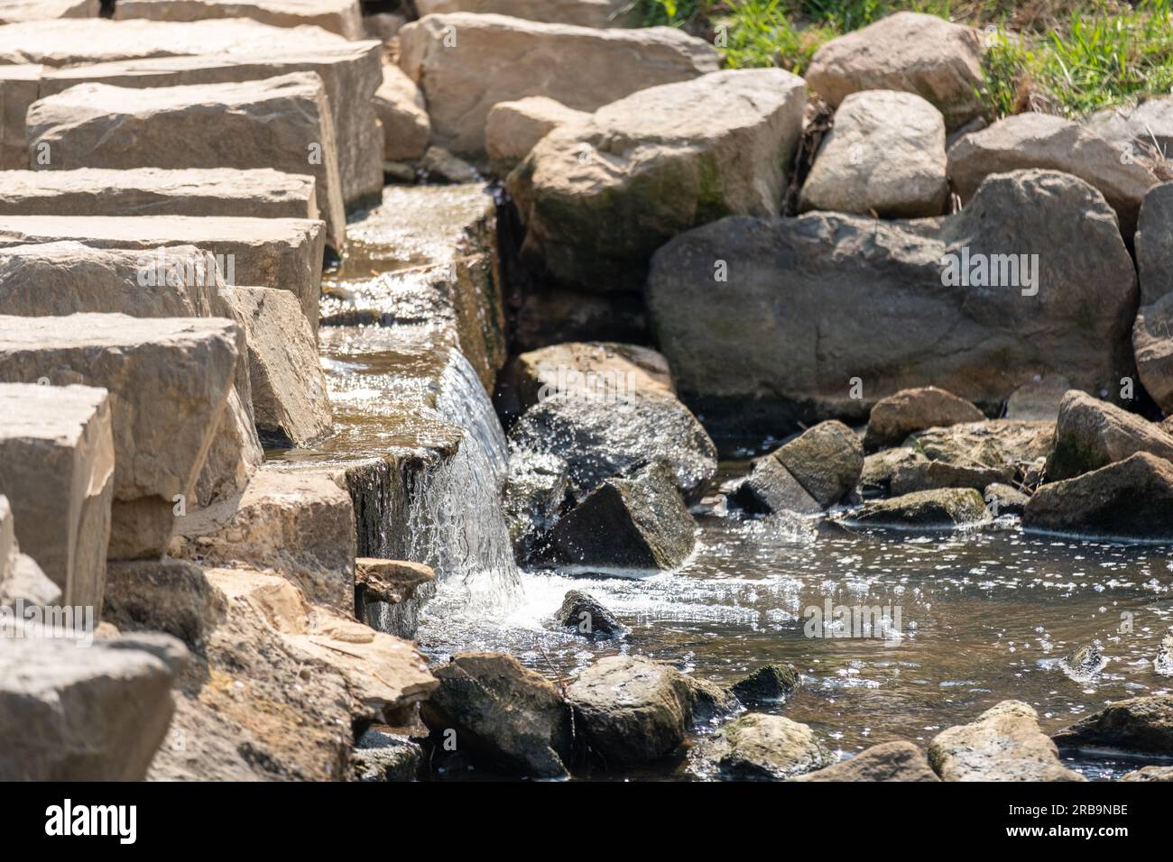 Water flows over colorful hi-res stock photography and images - Alamy