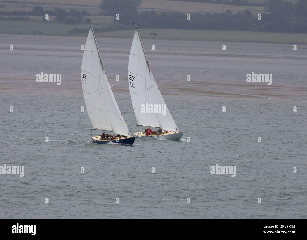 Four Fife One Design yachts sailing off Beaumaris in the Menai Straits ...