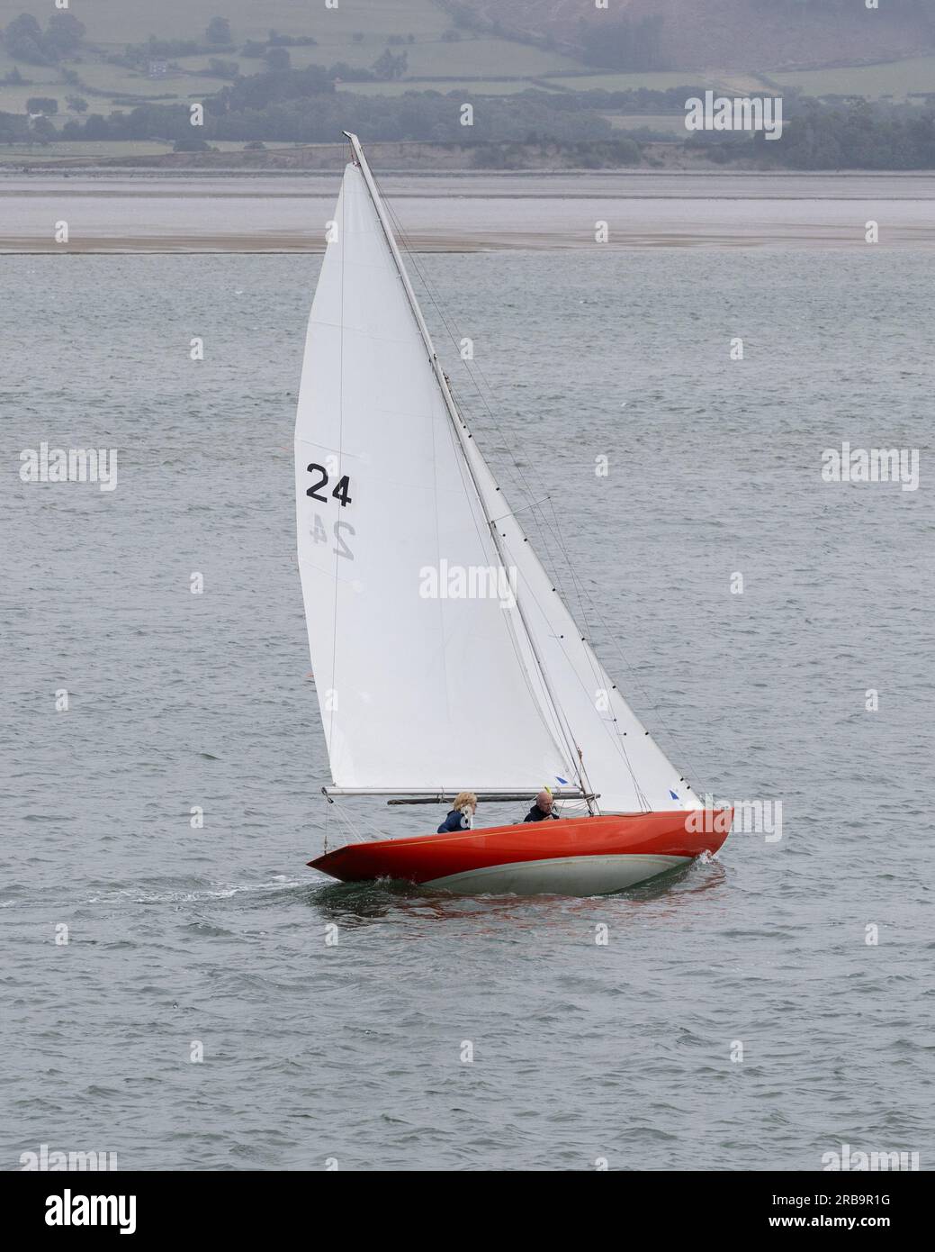 A Fife One Design yacht sailing off Beaumaris in the Menai Straits ...