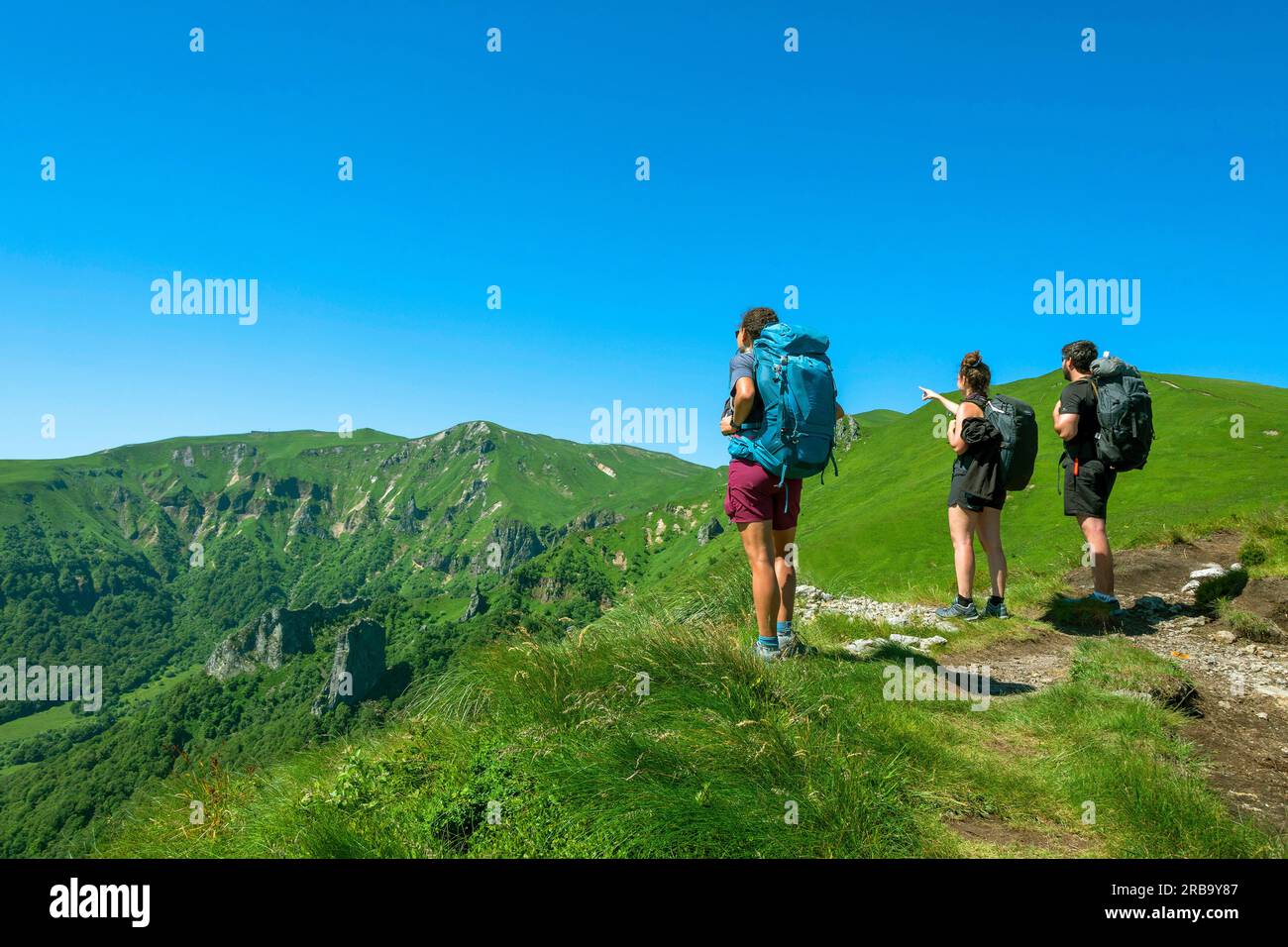 Hikers above the Chaudefour valley, Natural Reserve, Sancy massif ...