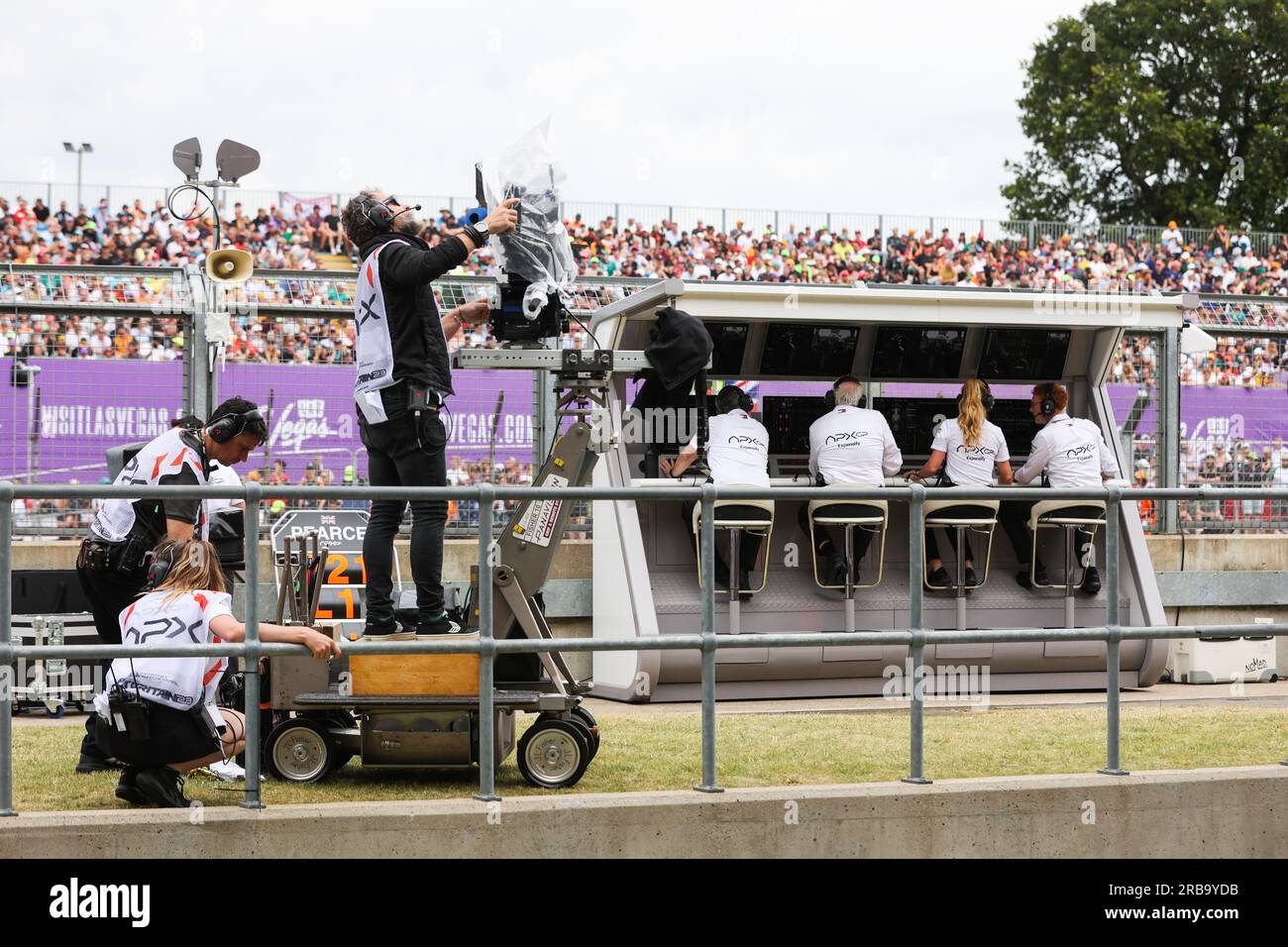APEX APXGP backstage of the Team crew filming on the pitwall for the F1 ...