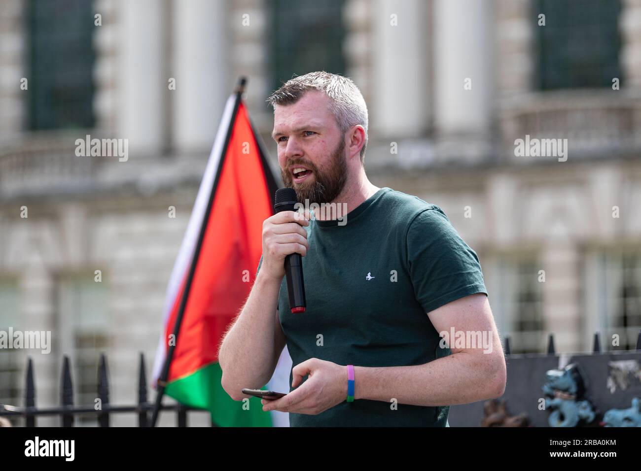 Belfast, UK. 08th July, 2023. Gerry Carroll MLA addressing the crowd at ...