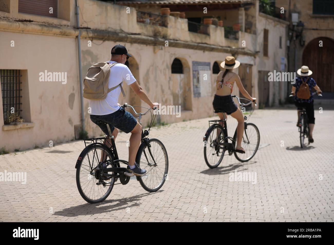 Palma, Spain. 08th July, 2023. Tourists cycling during the heat wave in ...