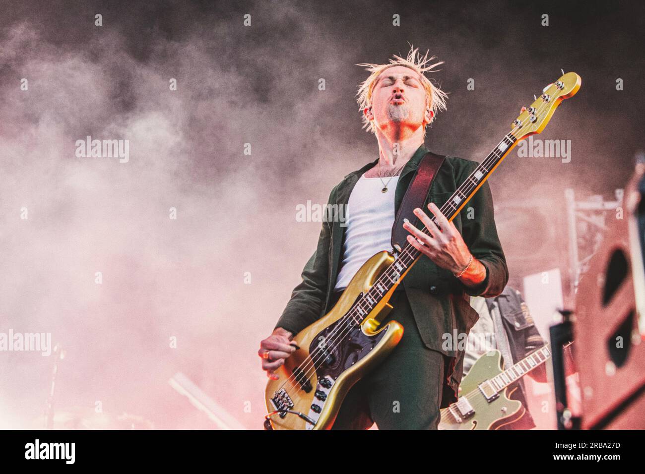 Michael Shuman and his band Queens of the Stone Age perform live in ...