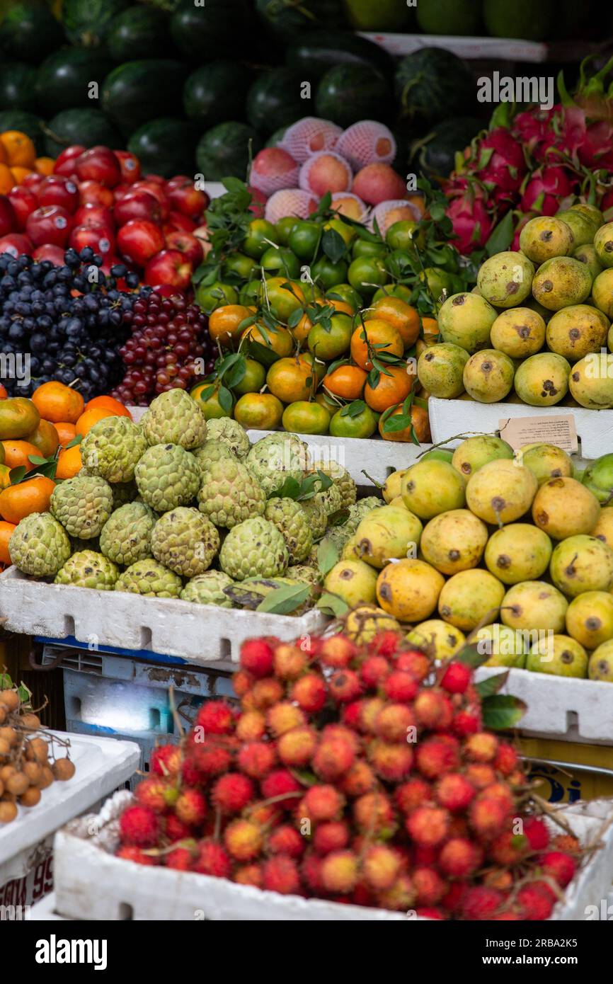 Variety of Asian Fruits at a market stall Stock Photo - Alamy