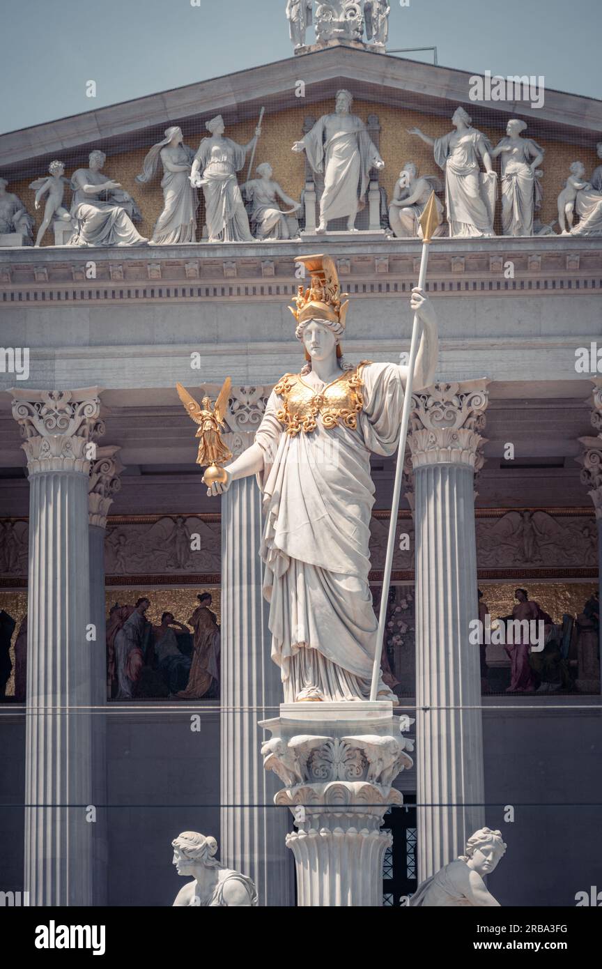 Roman marble statues in front of the austrian parliament building in ...
