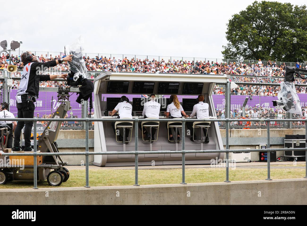 APEX APXGP backstage of the Team crew filming on the pitwall for the F1 ...
