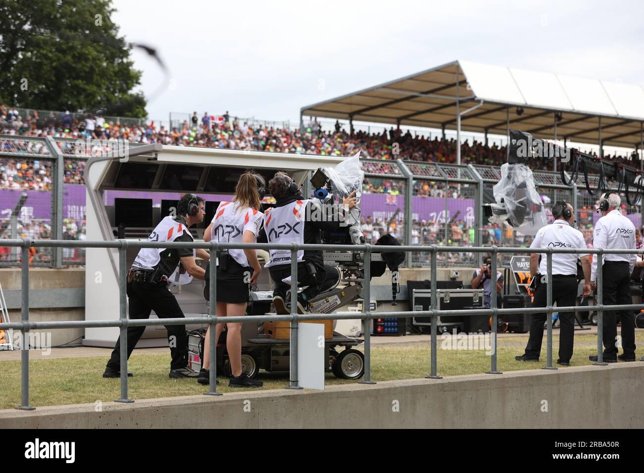 APEX APXGP backstage of the Team crew filming on the pitwall for the F1 ...