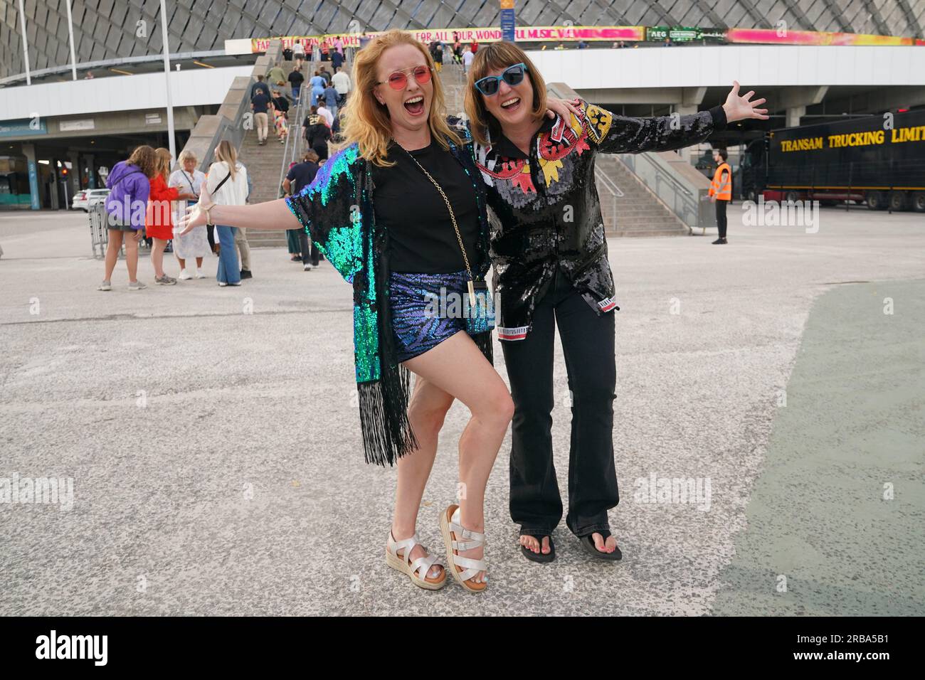 Concert goers Lydia Benecke Khan,38 from New York and Lauren Marles ...
