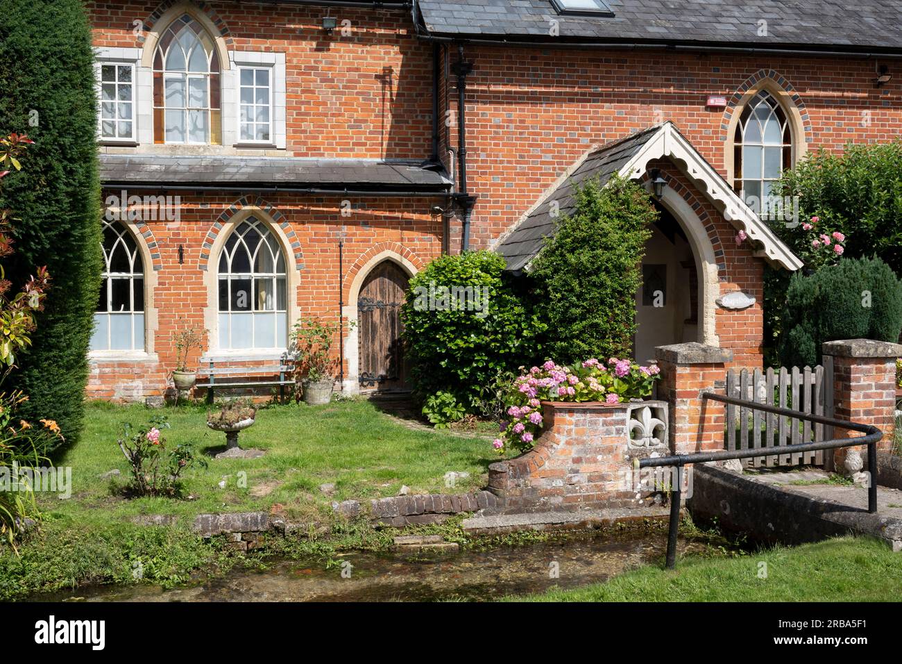 A chapel converted to a residential property and a stream flowing from ...