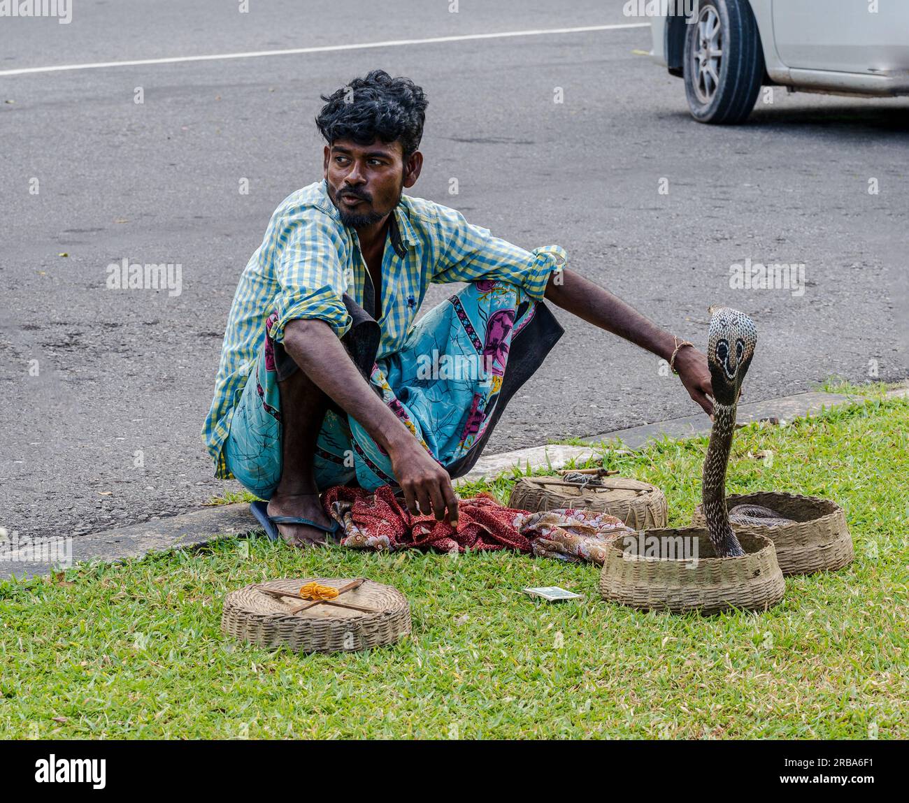 Colombo, Sri Lanka -- April 6, 2023. Photo of a Snake Charmer,with his ...