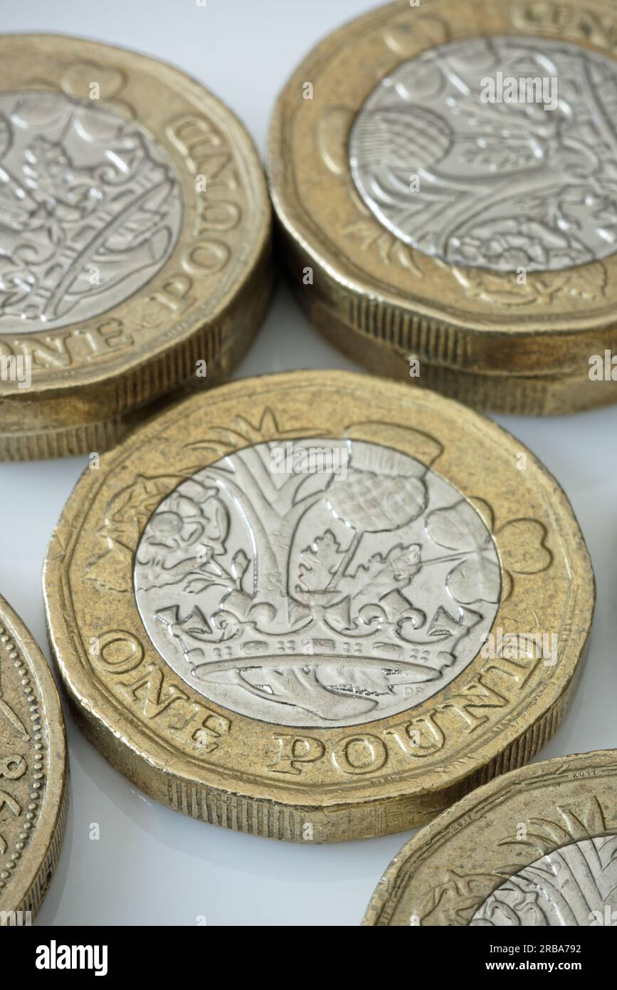 Uk pound coins in a stack hi-res stock photography and images - Alamy