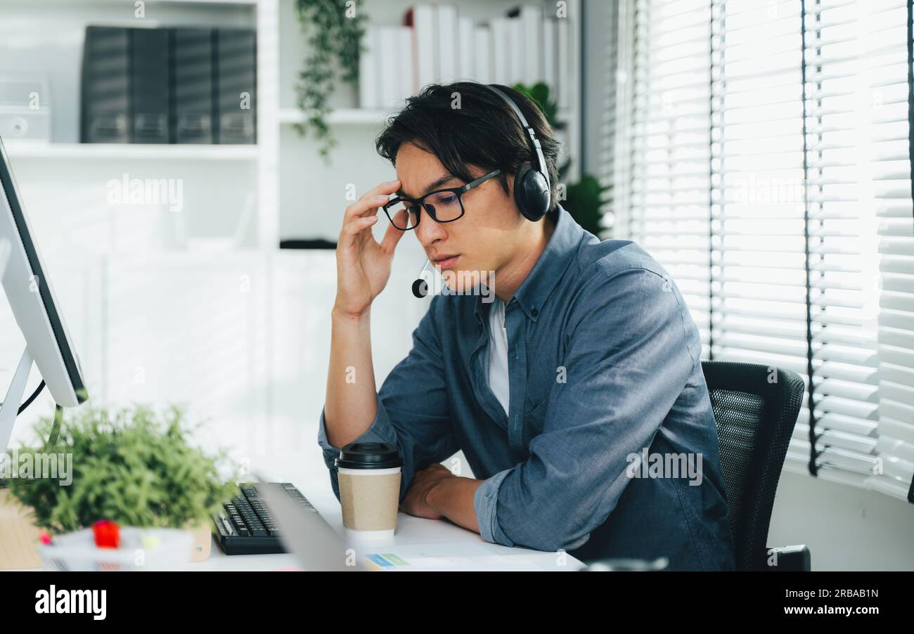 Tired receptionist hi-res stock photography and images - Alamy
