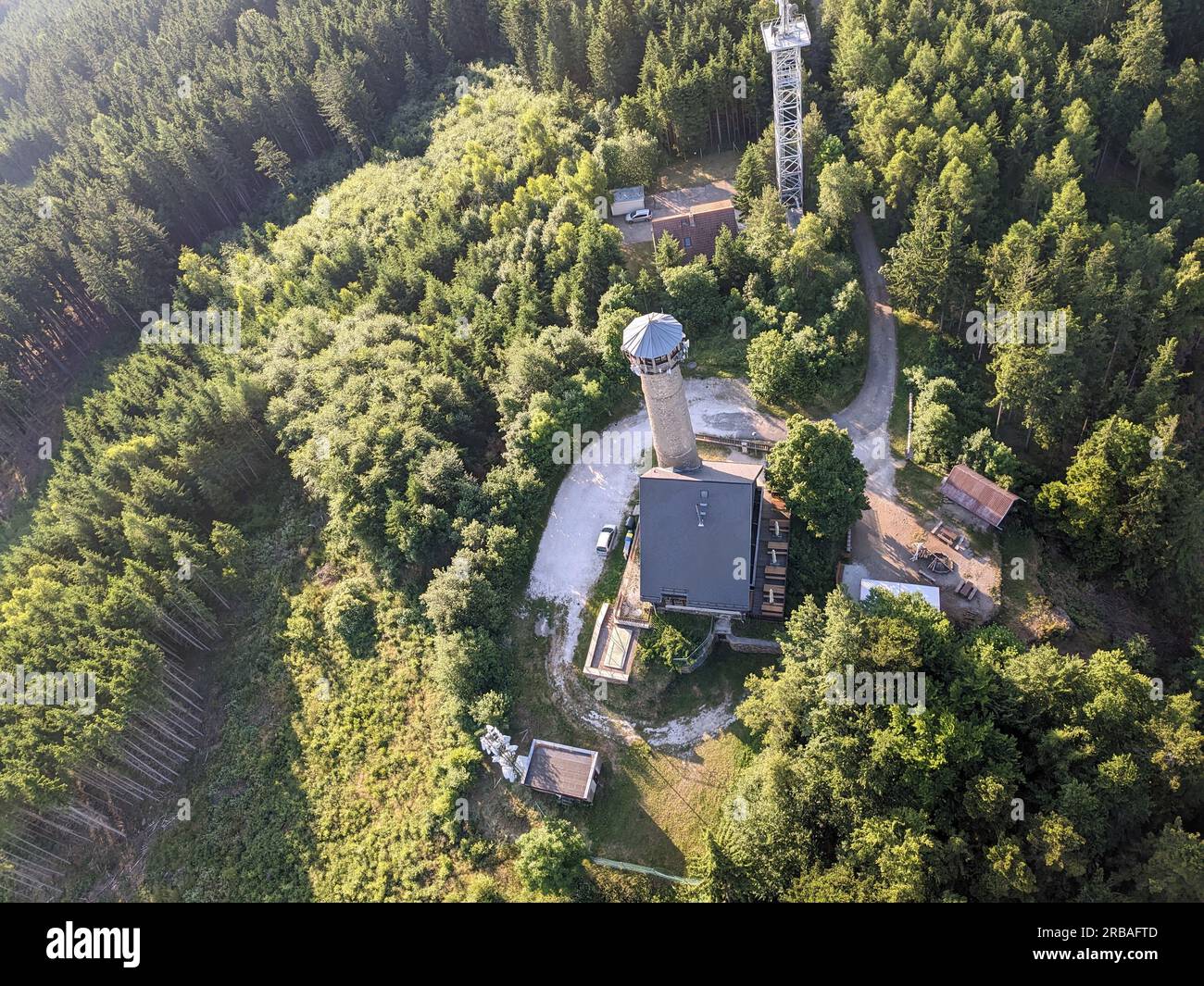 Aerial view of the top of Svatobor hill with a historic lookout tower ...