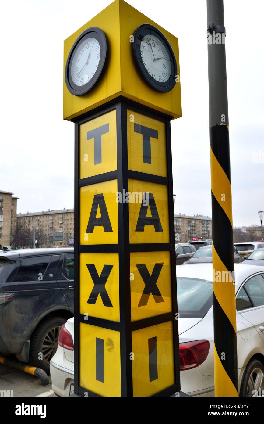 Moscow, Russia - March 5. 2017. Yellow taxi stop sign in a front of ...