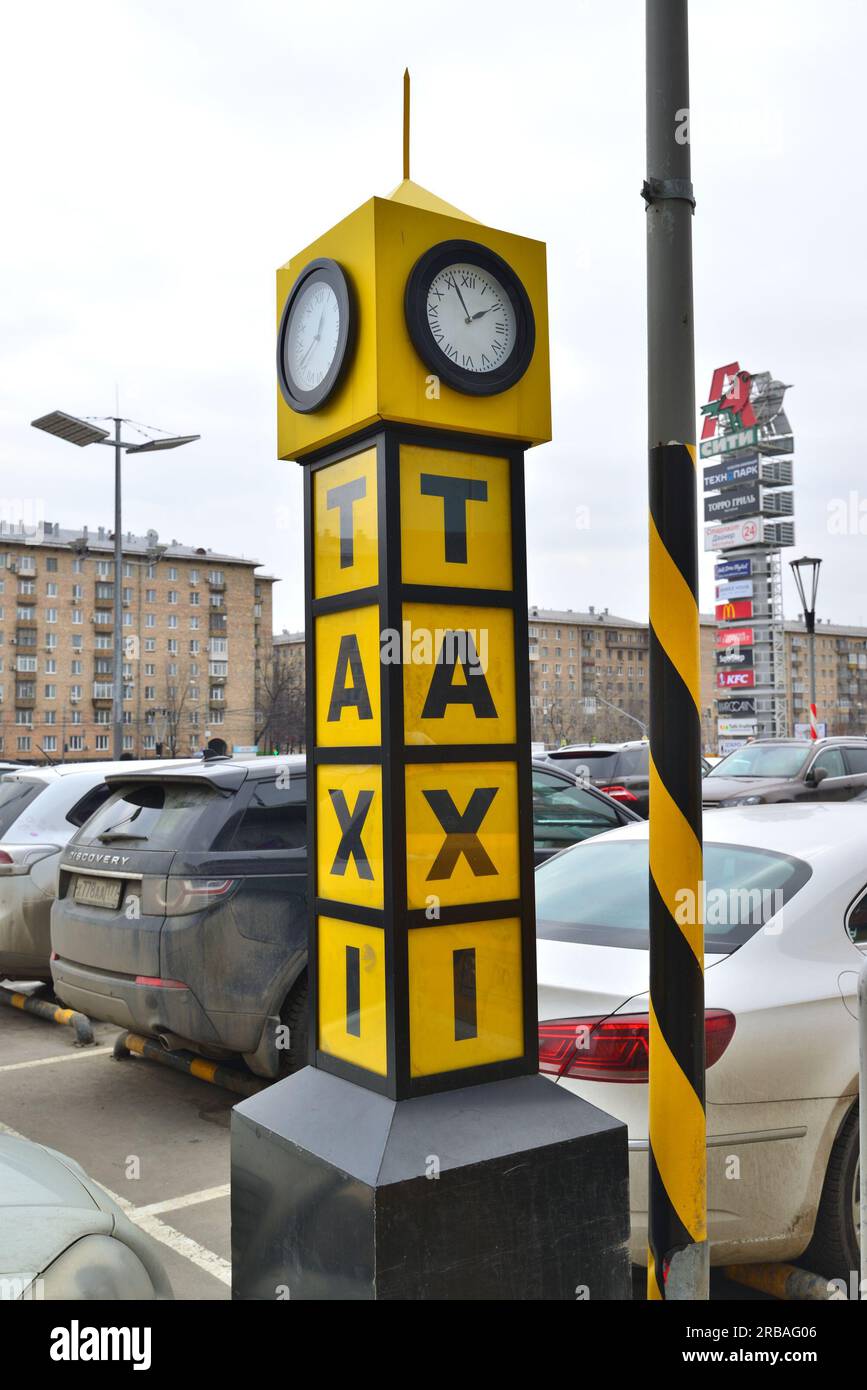 Moscow, Russia - March 5. 2017. Yellow taxi stop sign in a front of ...