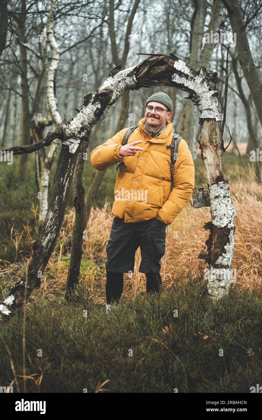 Bending tree pose hi-res stock photography and images - Alamy