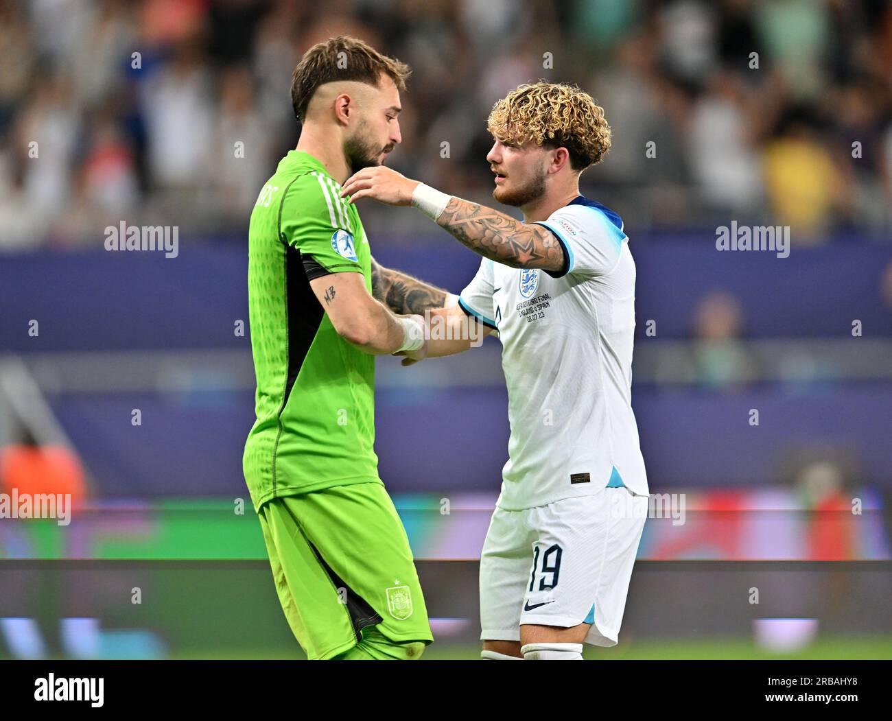 Spain goalkeeper Arnau Tenas greets England's Harvey Elliott following ...